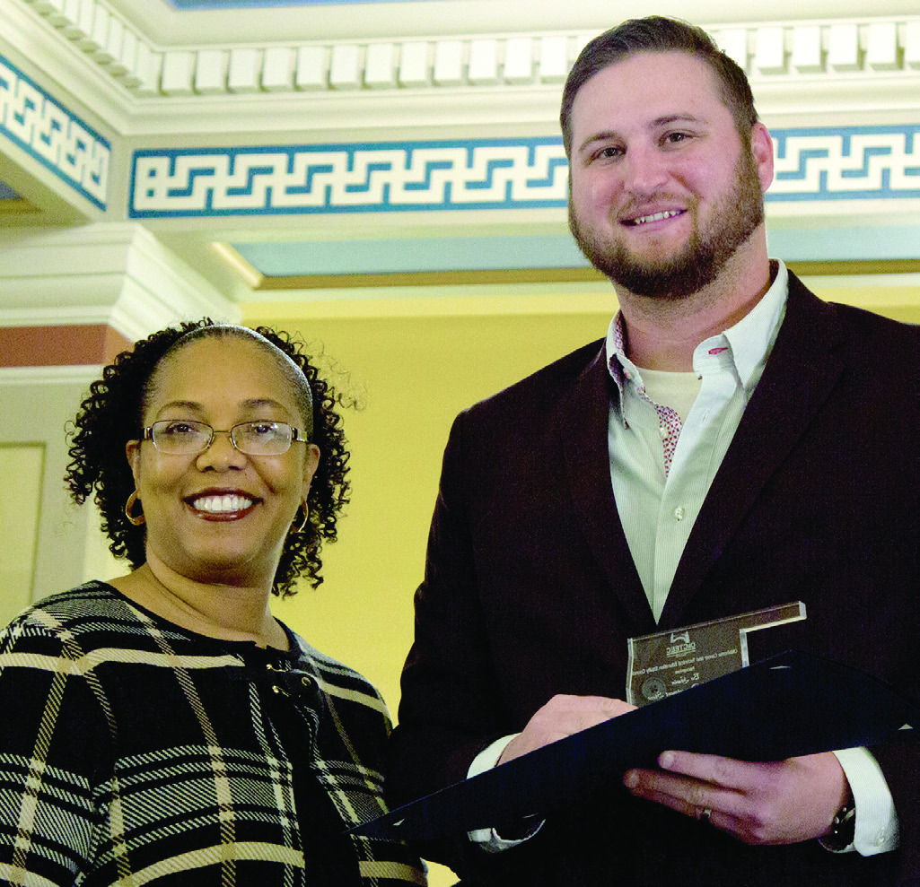 Sharpe’s manager honored at Making It Work Day - Okmulgee Times