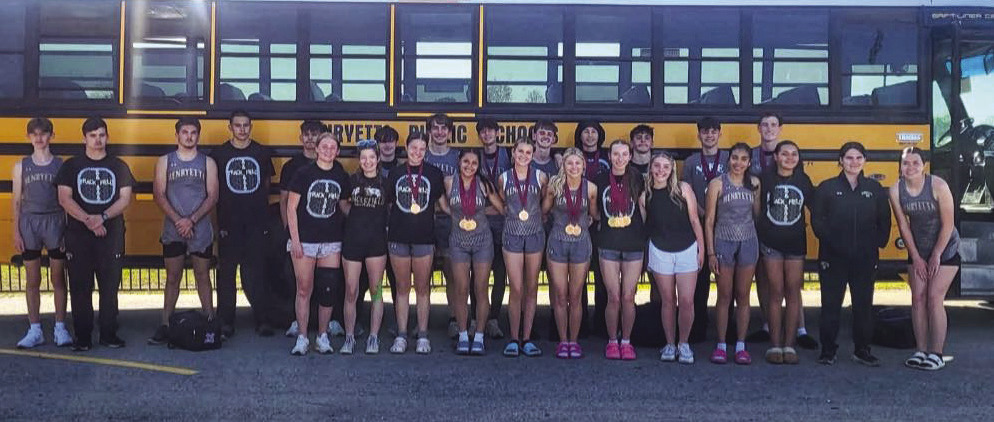 Henryetta, Wilson shine at Warner Meet